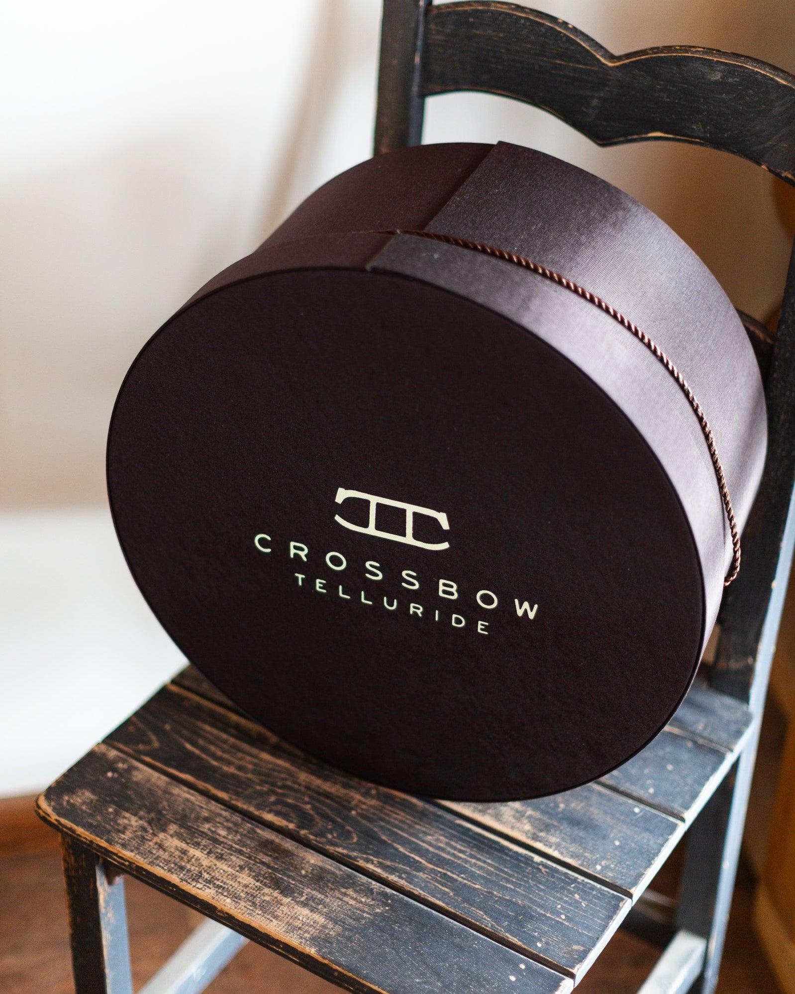 ROUND CROSSBOW HAT BOX– Crossbow